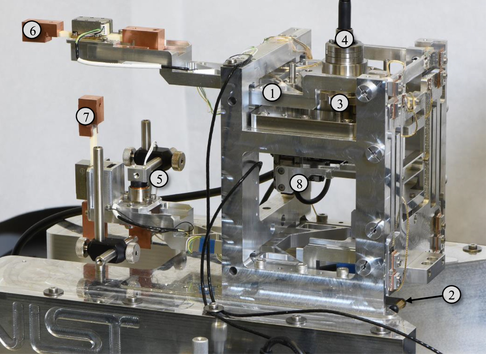 Development of a high precision electrostatic force balance for measuring quantity of dispensed ...