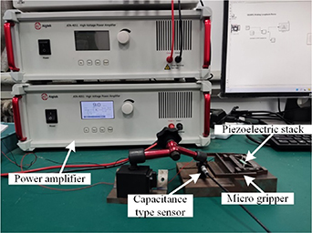 A three-stage amplification piezoelectric-actuated micro-gripper with adjustable output ...