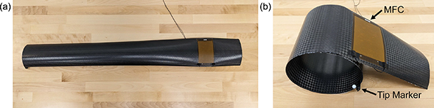 Uncoiling deployment of thin-shell composite booms with piezoelectric ...