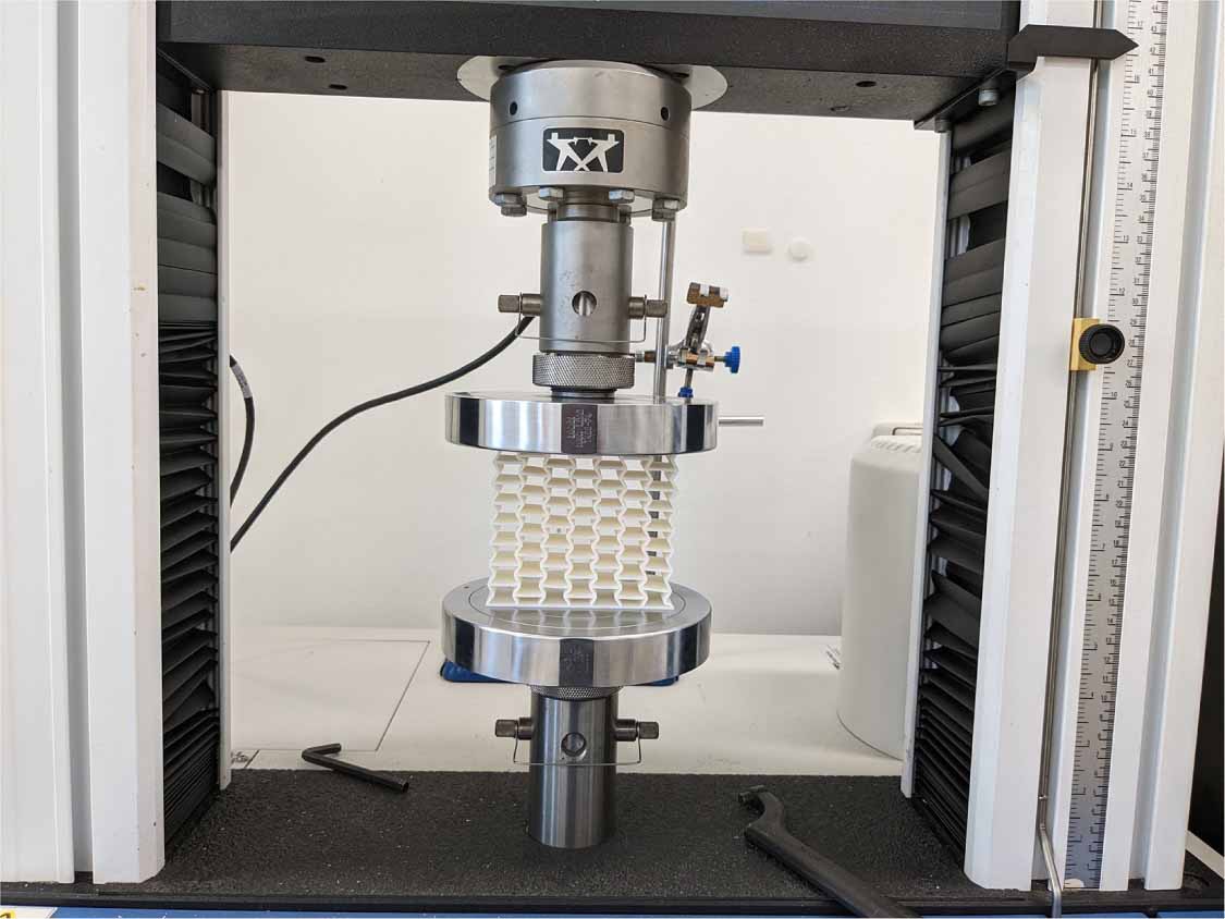 Influence of material plasticity and bimodularity on the compressive ...