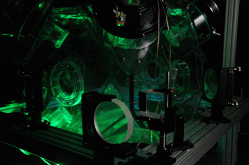 Clustering of settling charged particles in turbulence: theory and ...