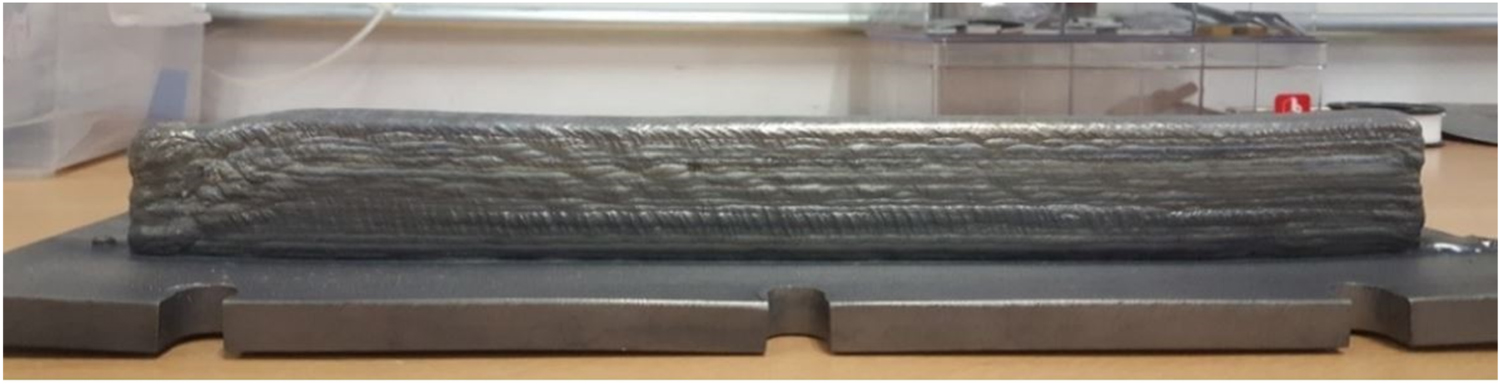 Experimental investigation of hot-wire laser deposition for the ...